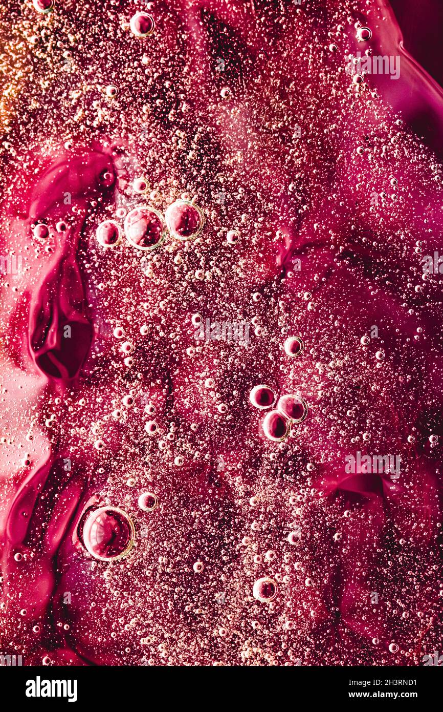 Abstract red liquid background, paint splash, swirl pattern and water ...