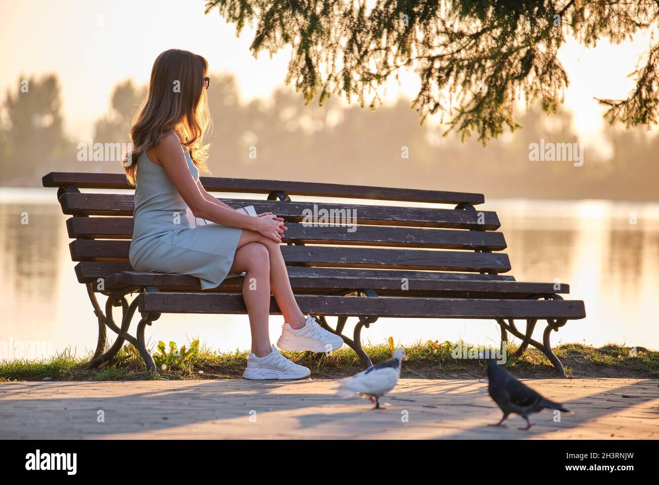 Sad Girl Sitting Alone On Bench