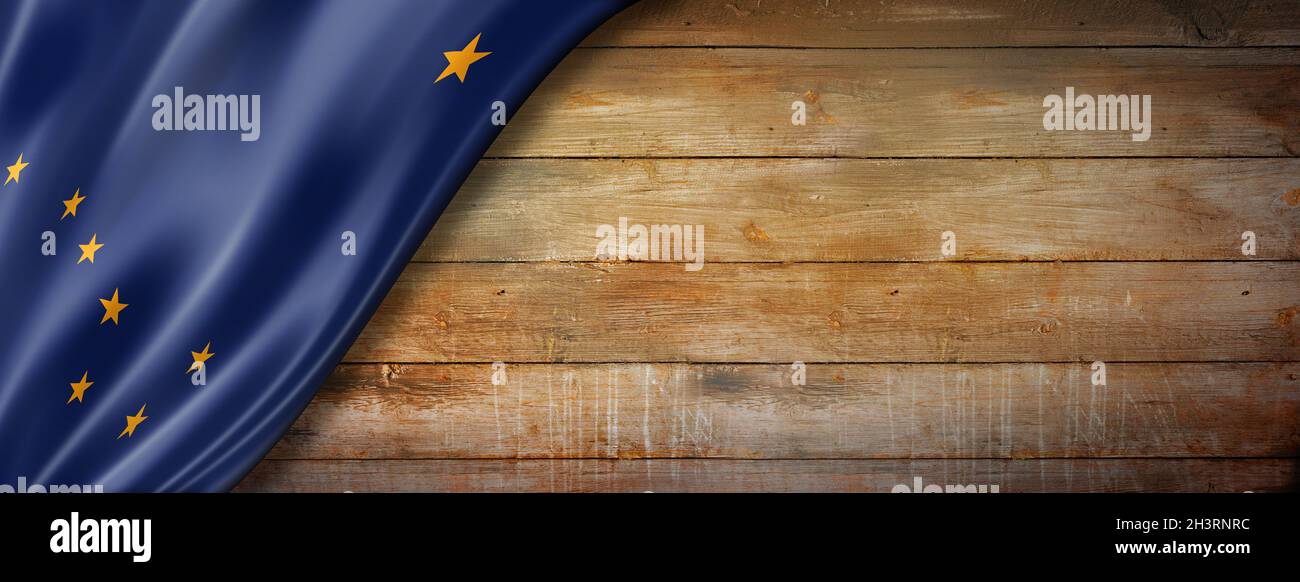 Alaska flag on old wood wall banner, USA Stock Photo - Alamy