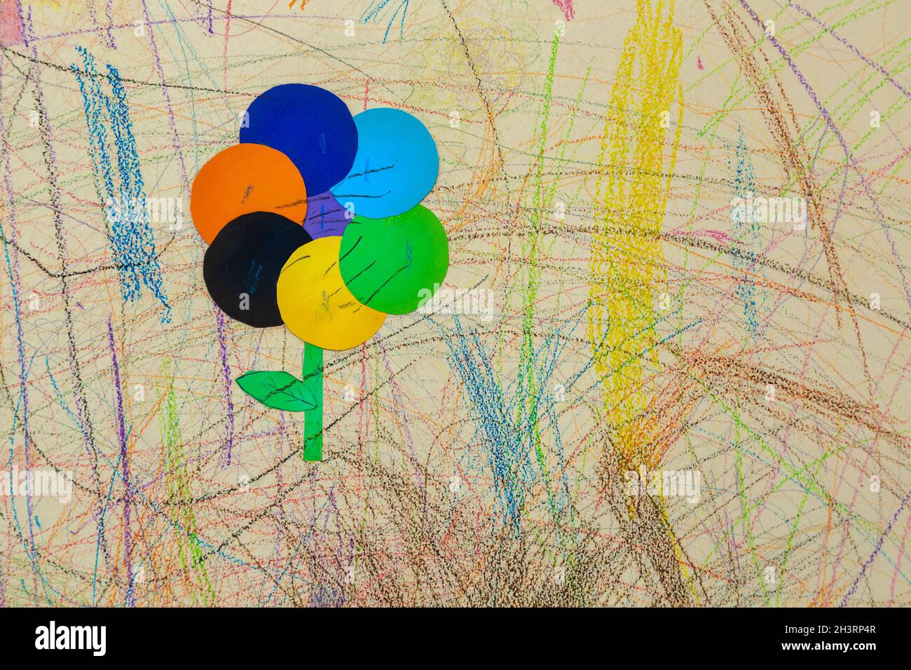 The flower or weather vane figure, made by the child by cutting out ...