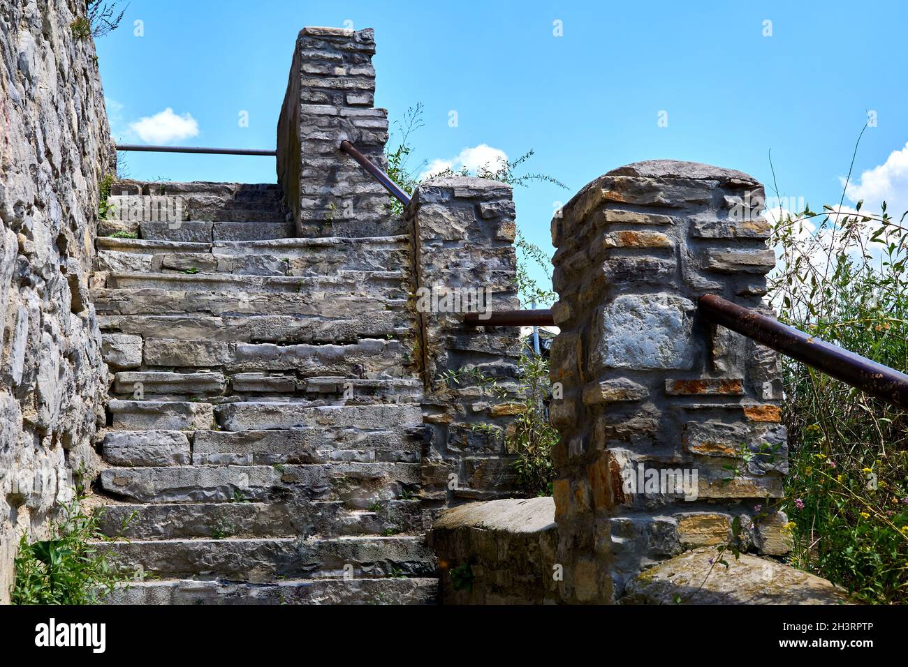 Old stone staircase with railing on the background of the sky Stock ...