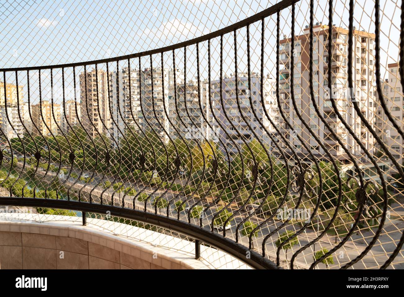 Iron railings and strong mesh netting that protect children and pets ...