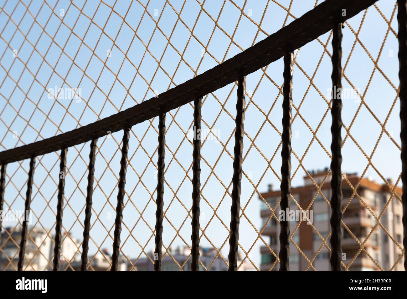 Iron railings and strong mesh netting that protect children and pets ...
