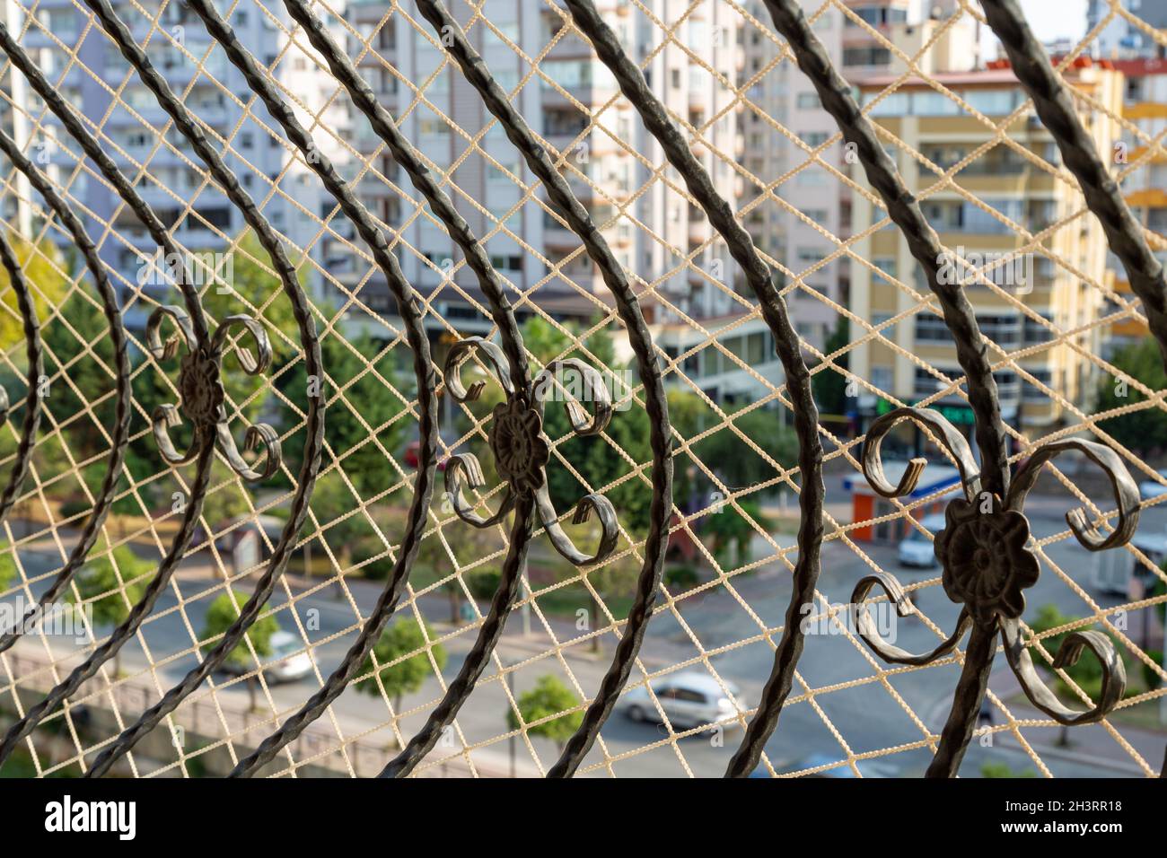 Iron railings and strong mesh netting that protect children and pets ...
