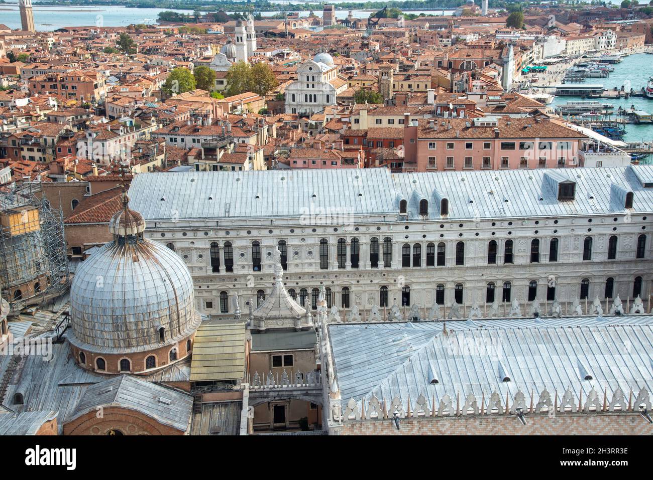 aerial view of domes of the basilica at San Marco Square and rooftops ...