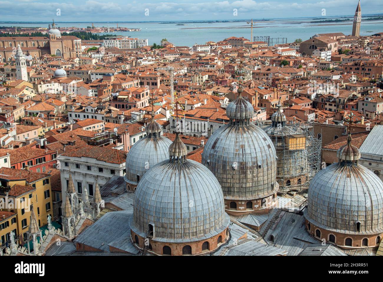 aerial view of domes of the basilica at San Marco Square and rooftops ...