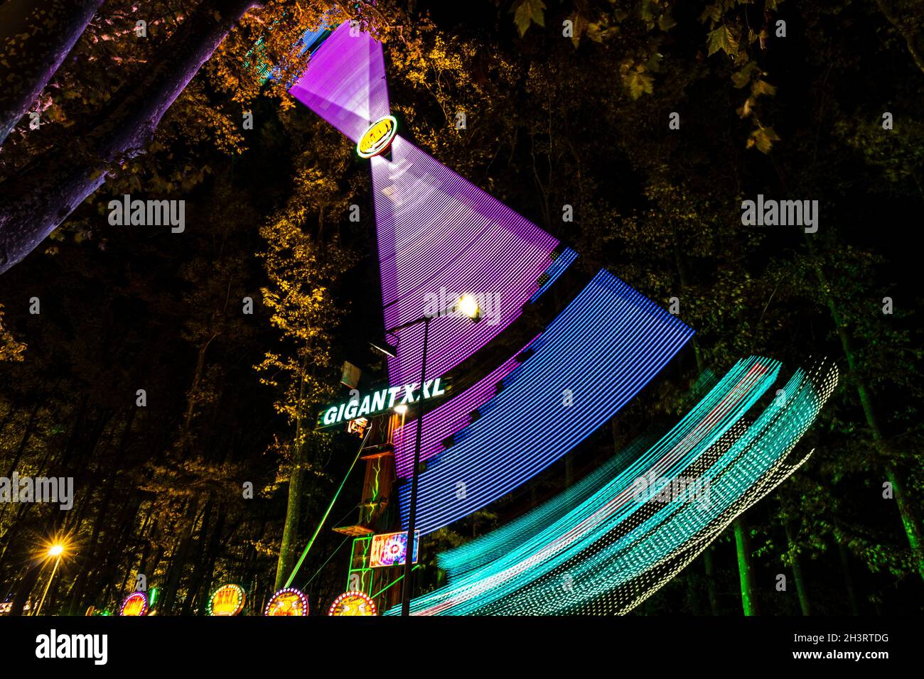 Giant XXL ride at a funfair in Girona, Spain Stock Photo - Alamy