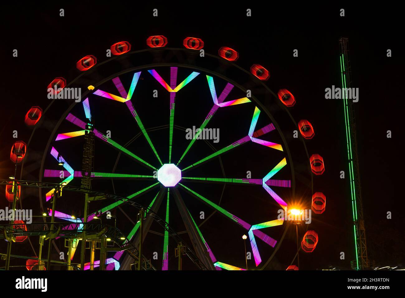 Large ferris wheel neon lights hi-res stock photography and images - Alamy