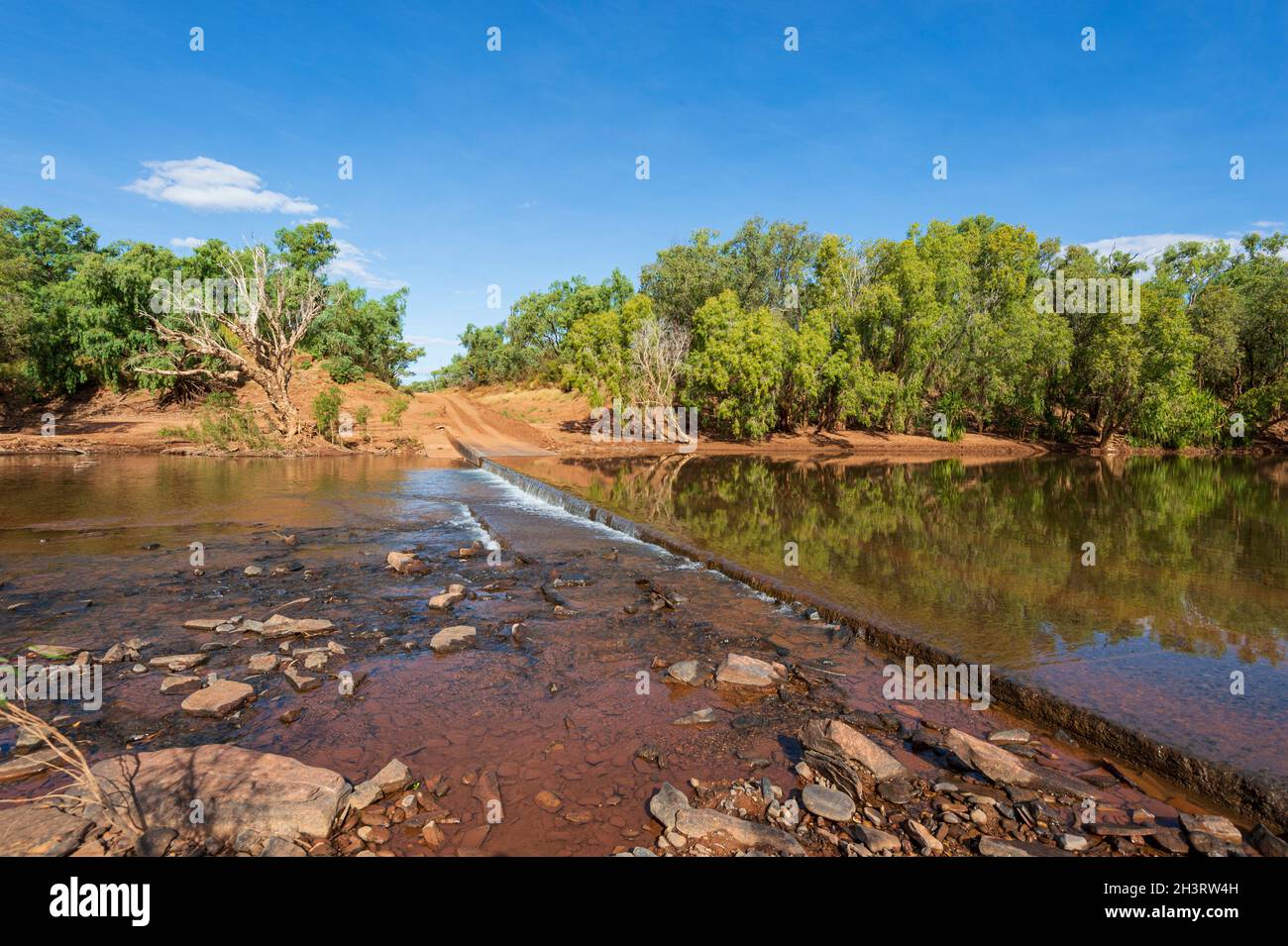 Flooded creek crossing on the remote Buchanan Highway, named after the ...