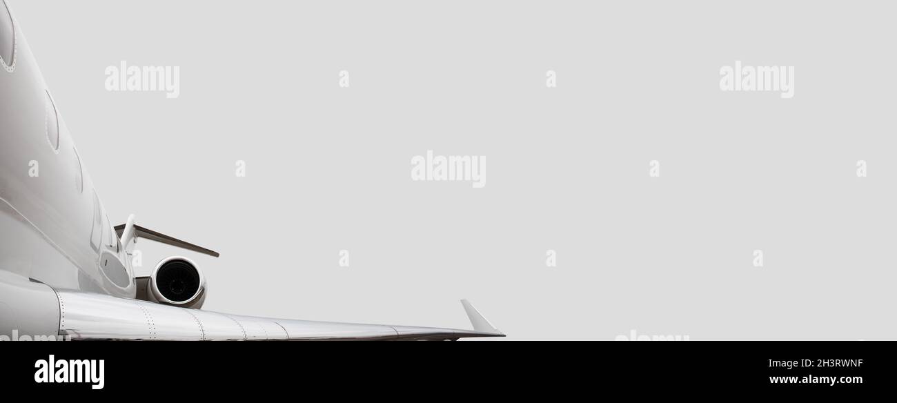 Engine on a modern private jet airplane with a tail wing, panoramic ...