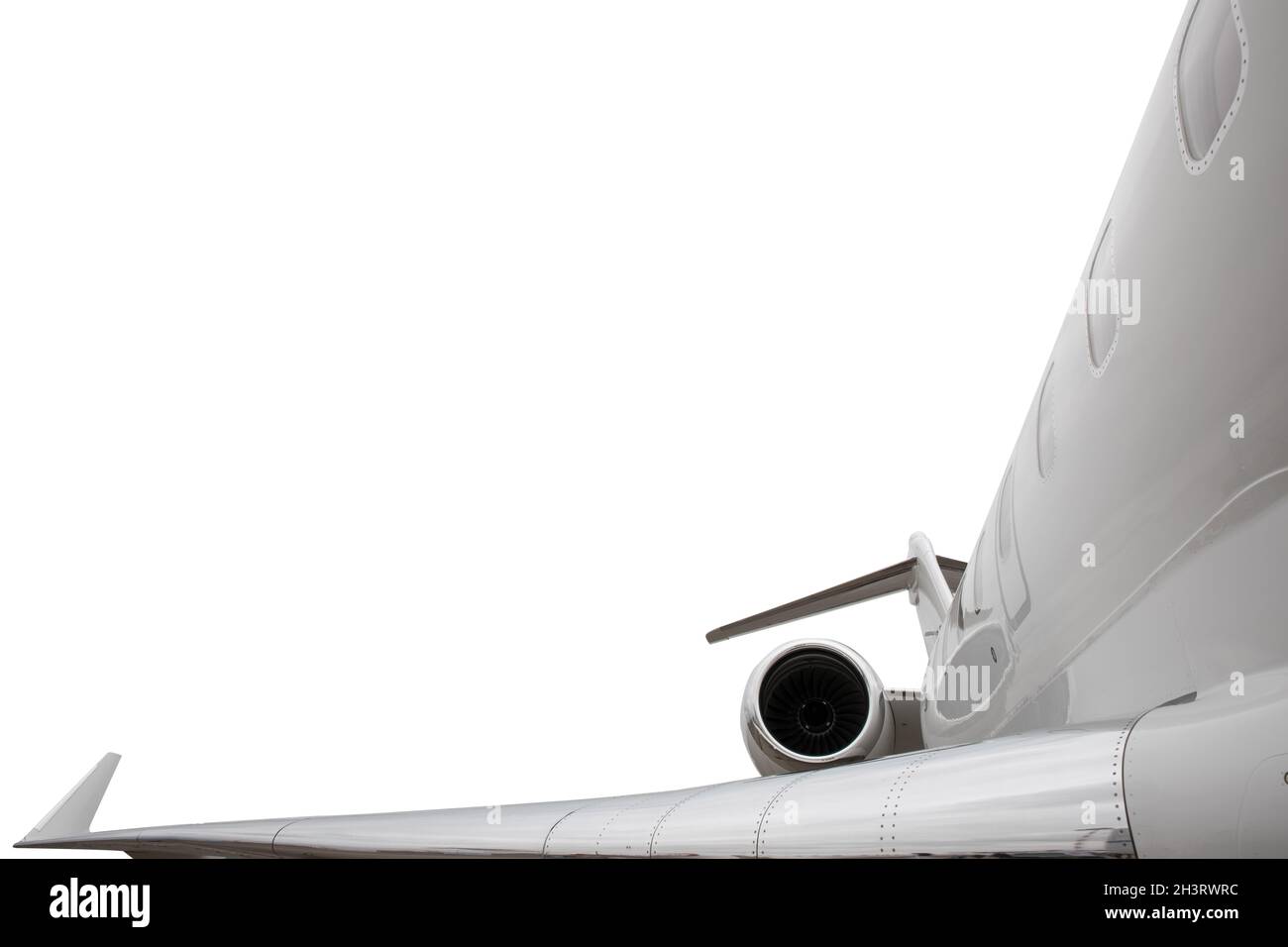 Engine on a modern private jet airplane with a tail wing isolated on ...