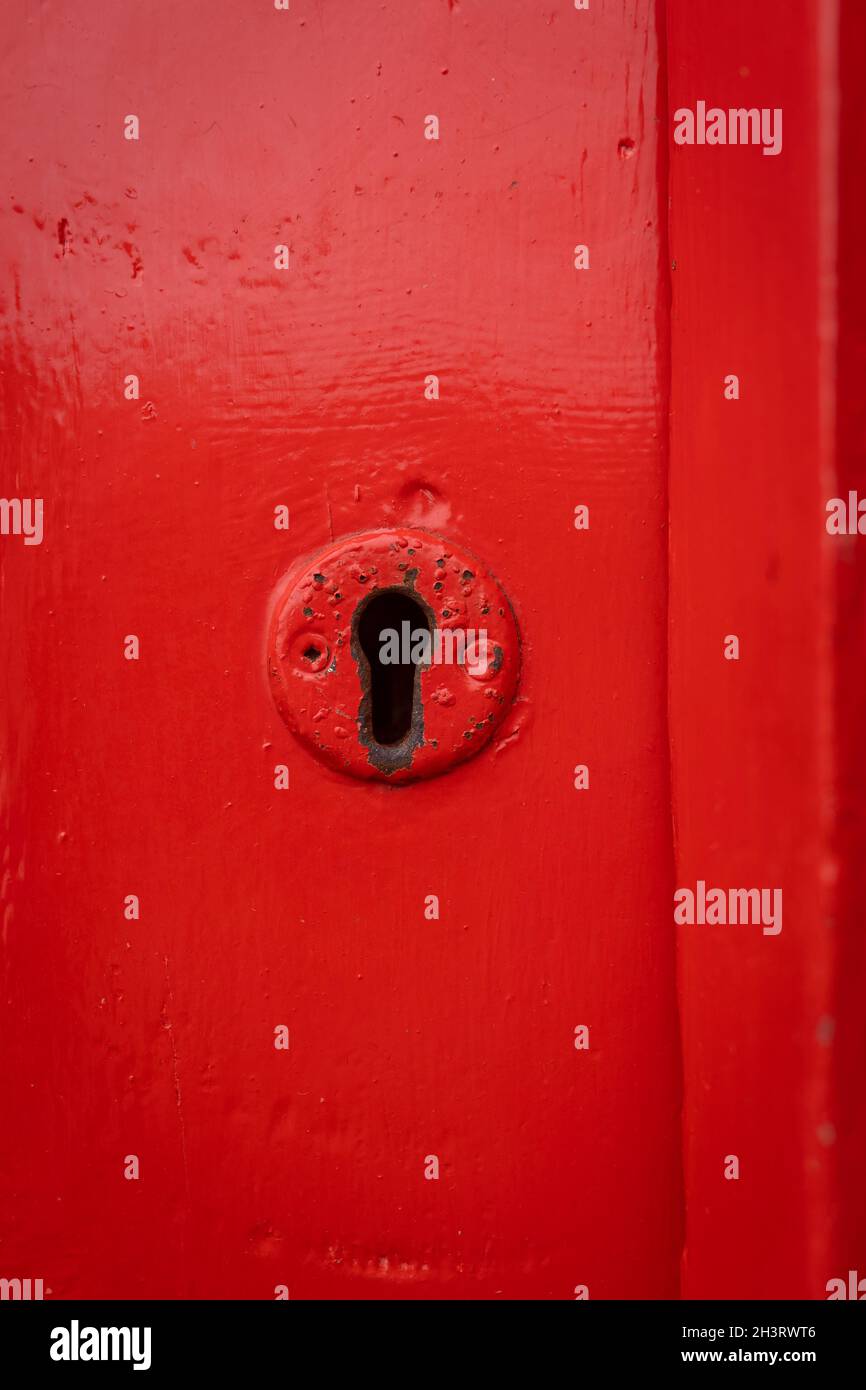 Red old lock key hole in wooden door painted bright retro historic red ...