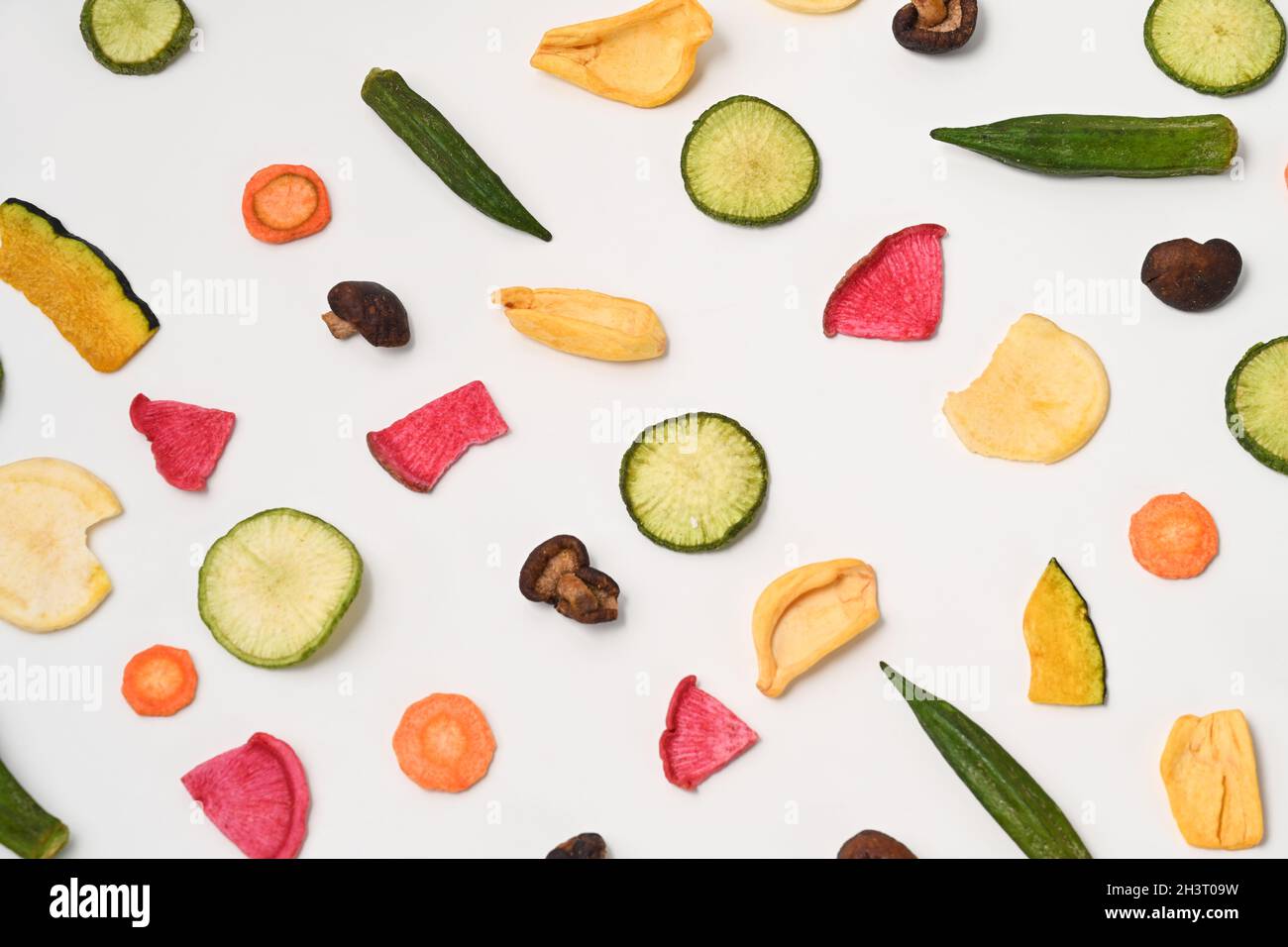 Mix vegetable chips on white background. Vegan food Stock Photo - Alamy