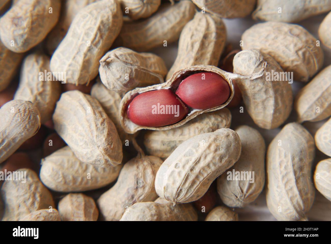 detail shot of Processed pea nuts on table top down Stock Photo - Alamy
