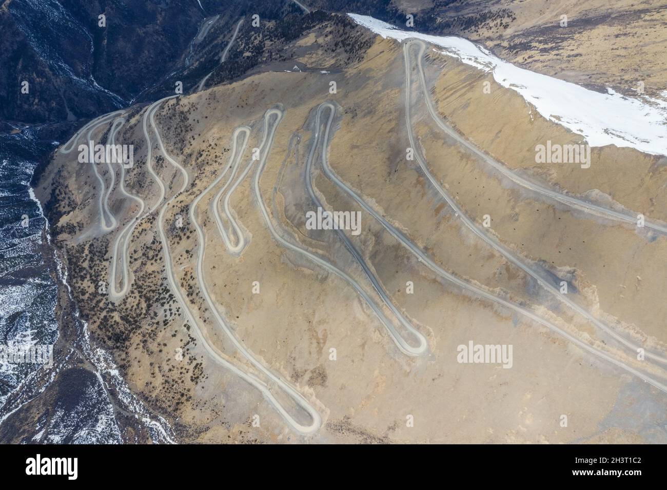 Aerial view of the rough road Stock Photo - Alamy