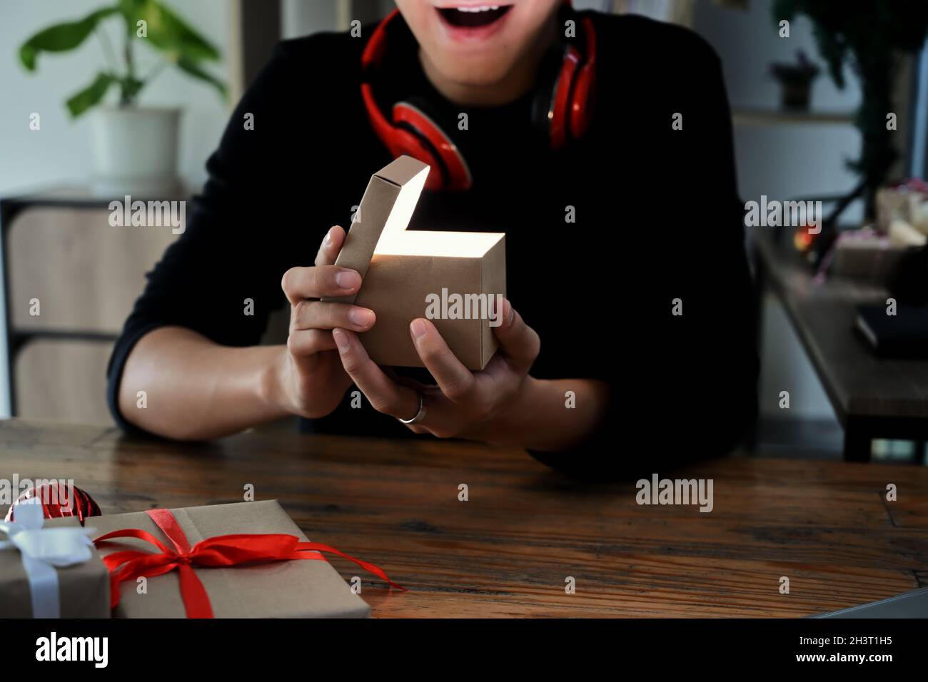 Excited young man opening hi-res stock photography and images - Alamy