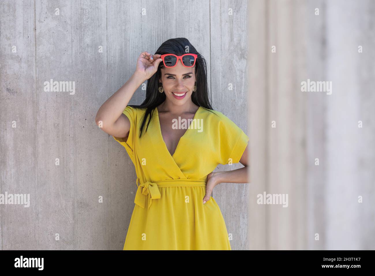 Lady wearing yellow dress hi-res stock photography and images - Alamy