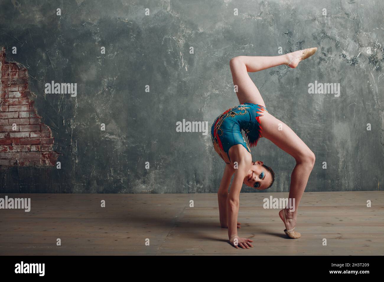 Young girl professional rhythmic gymnastics training at studio Stock ...