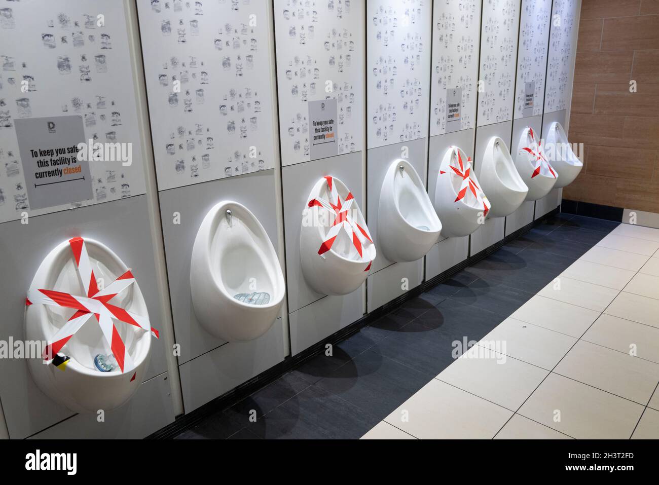 Taped off urinal hi-res stock photography and images - Alamy