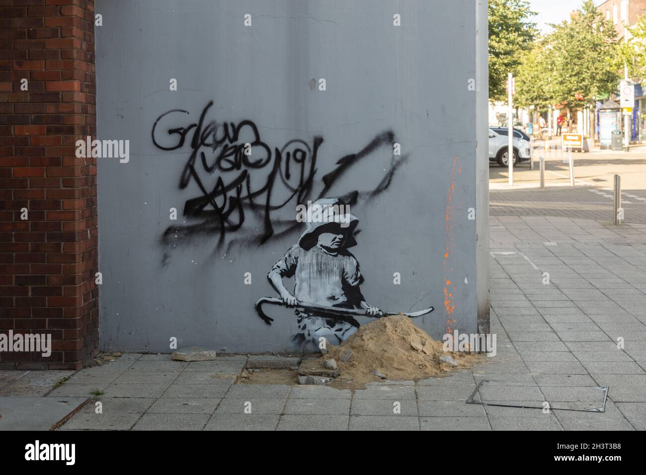 Banksy street art of child with crowbar on London Road North in ...