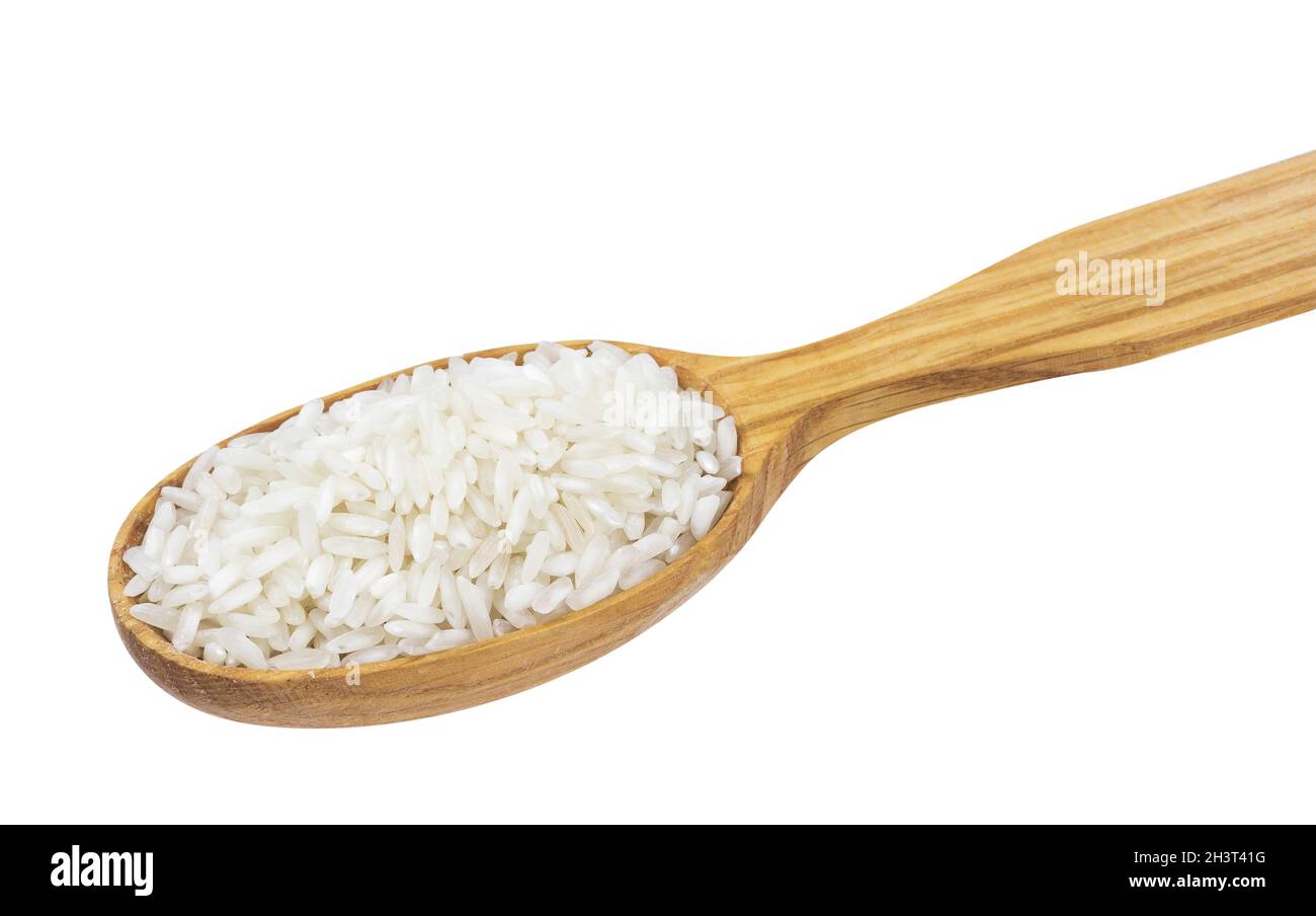 Basmati rice in wooden spoon isolated on white Stock Photo - Alamy