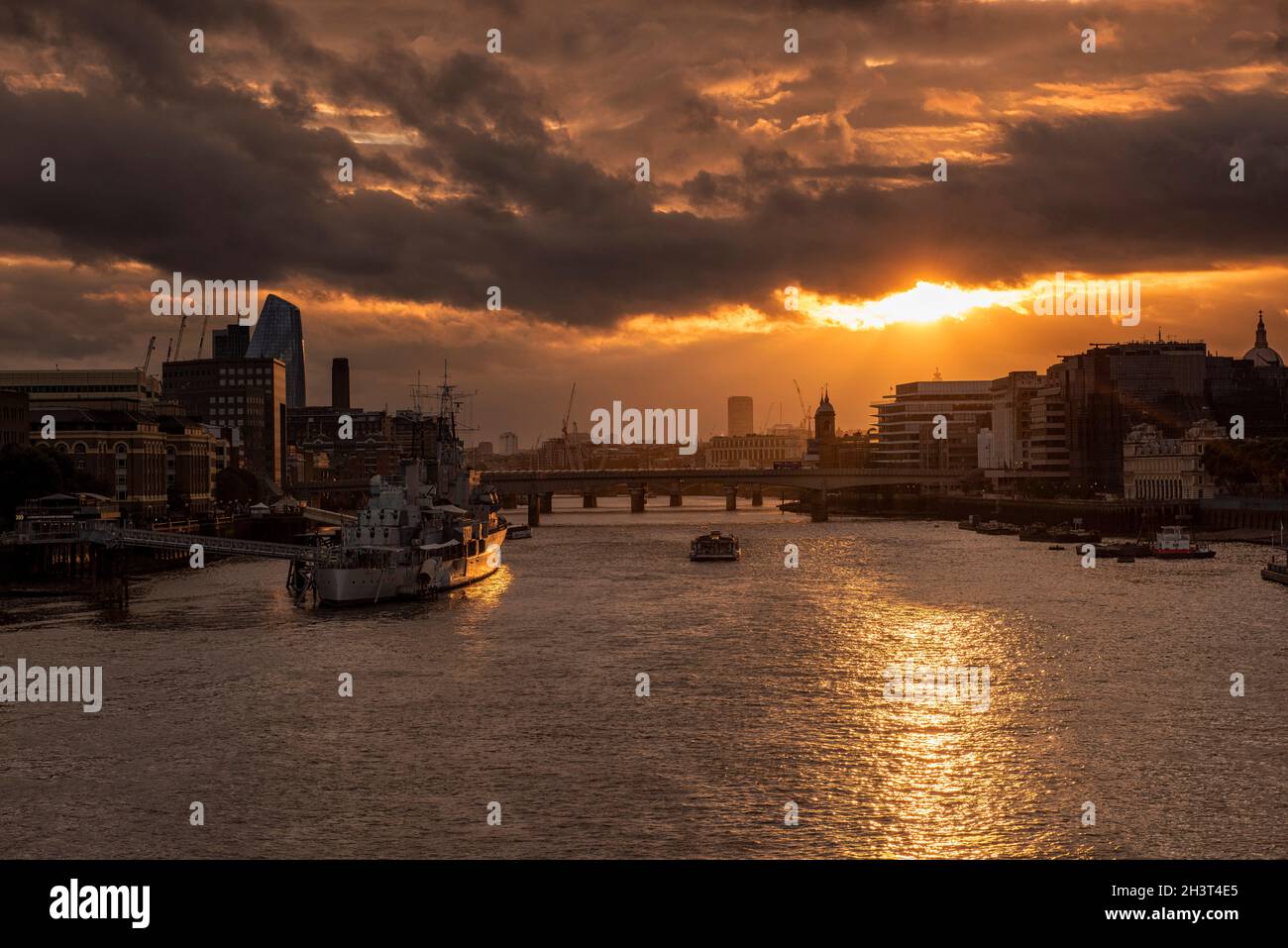 Sunset on the River Thames, looking towards London Bridge from Tower ...
