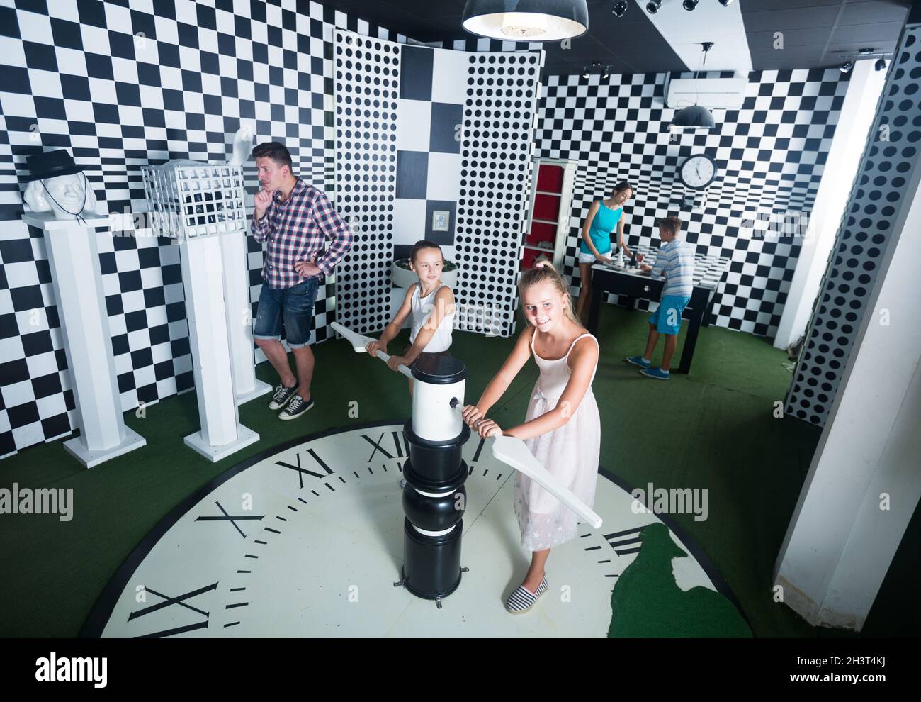 Portrait of family who is visiting the lost room Stock Photo - Alamy