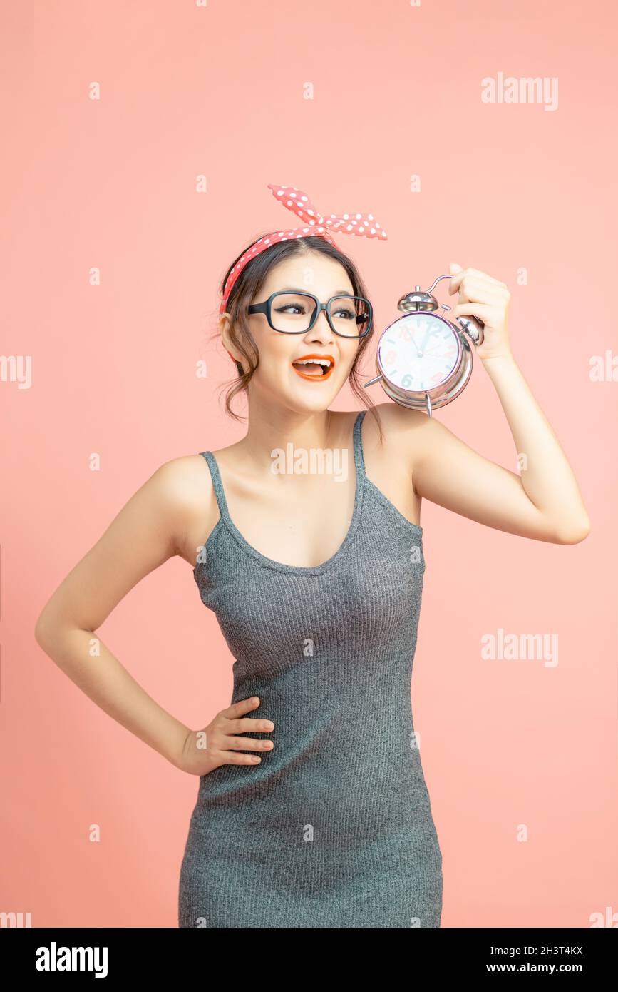 Woman and clock retro hi-res stock photography and images - Alamy
