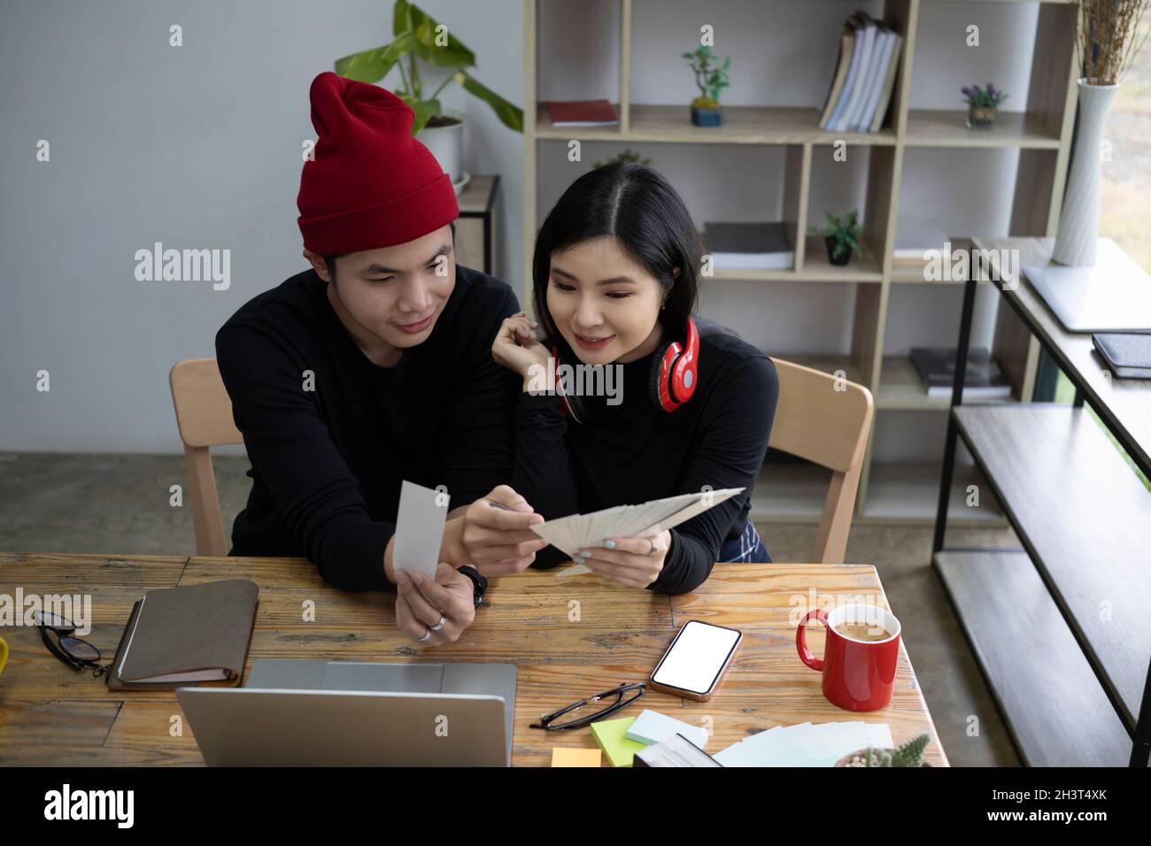 Group of creative people discussing and planning project together Stock ...