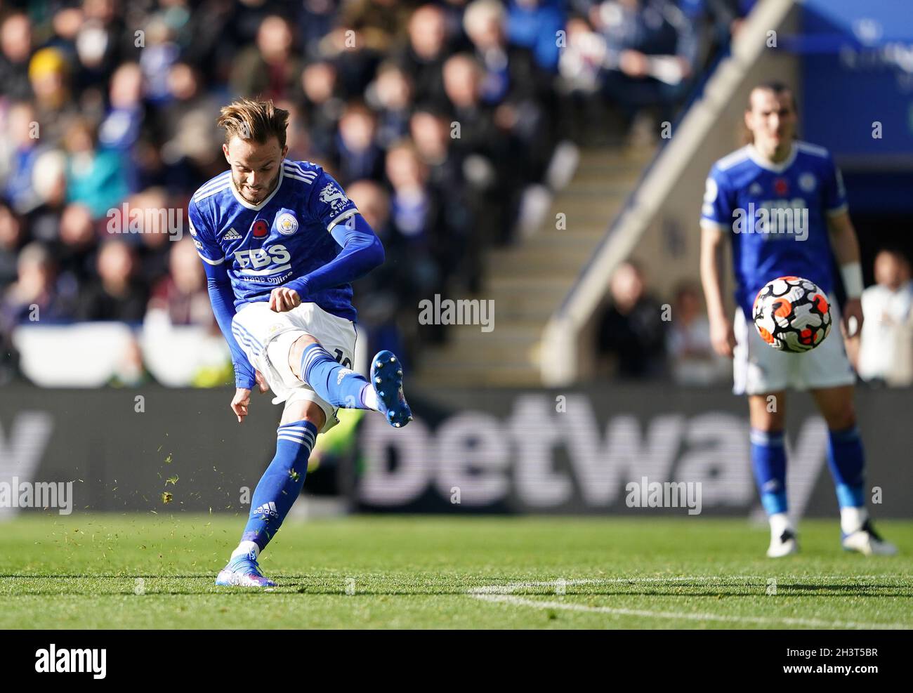 Leicester City's James Maddison takes a free kick that is saved during ...