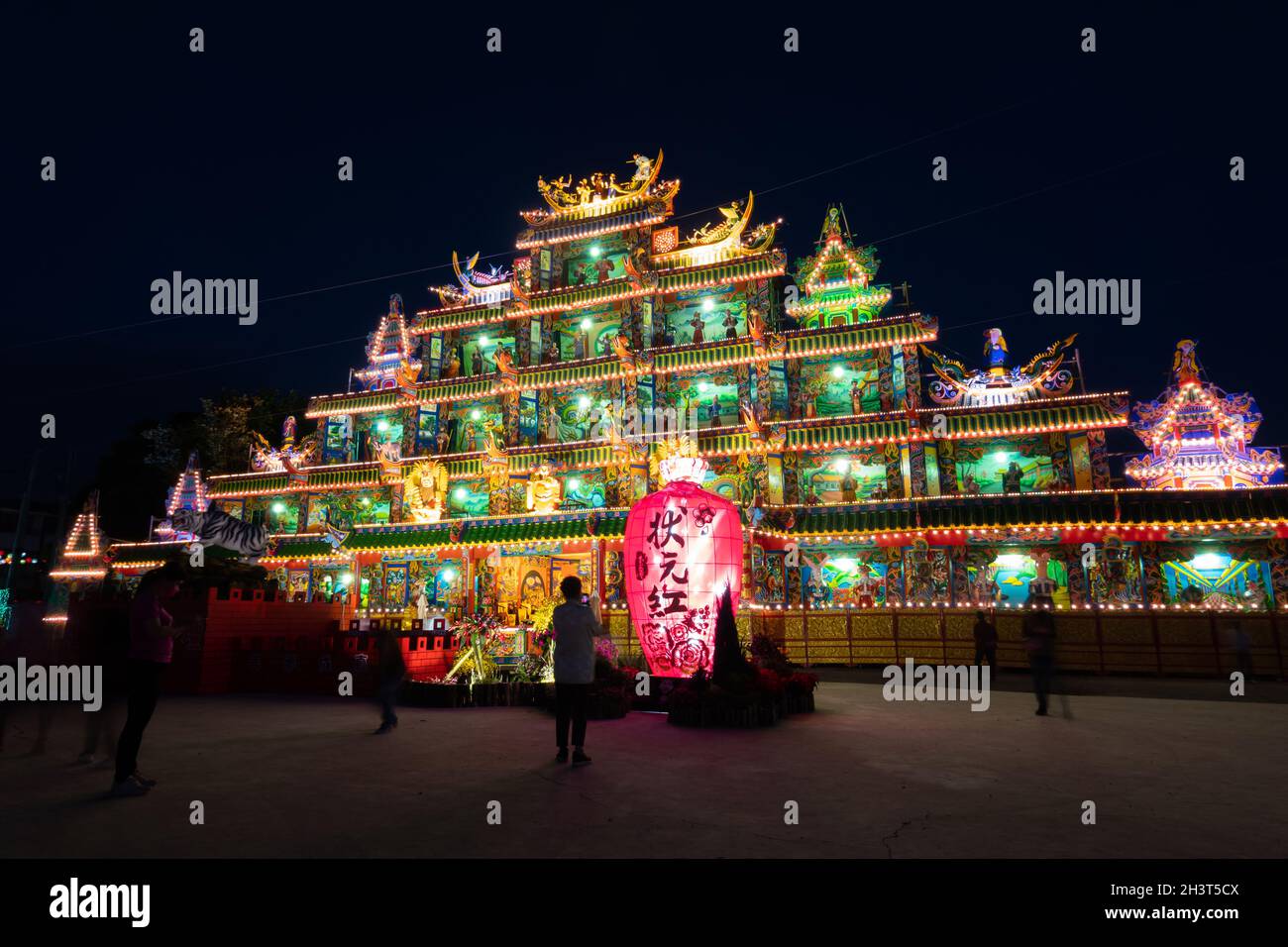 Colorful building in the night Stock Photo - Alamy
