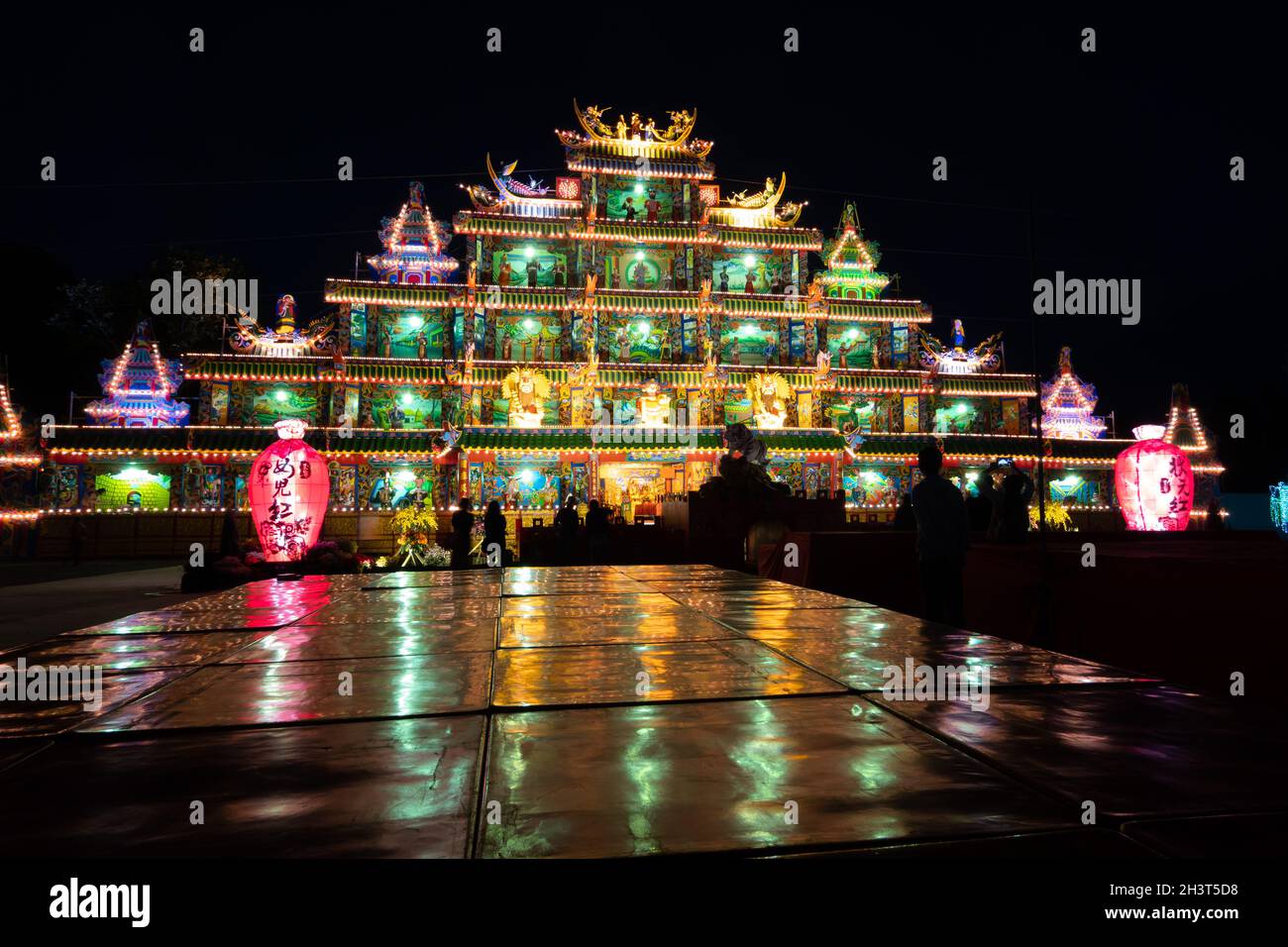 Colorful building in the night Stock Photo - Alamy