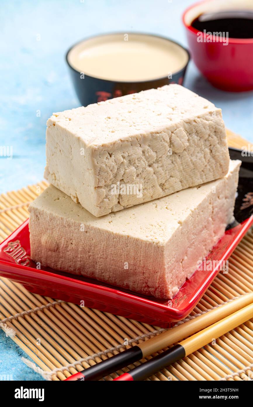Soy curd (tofu) in a ceramic bowl Stock Photo - Alamy