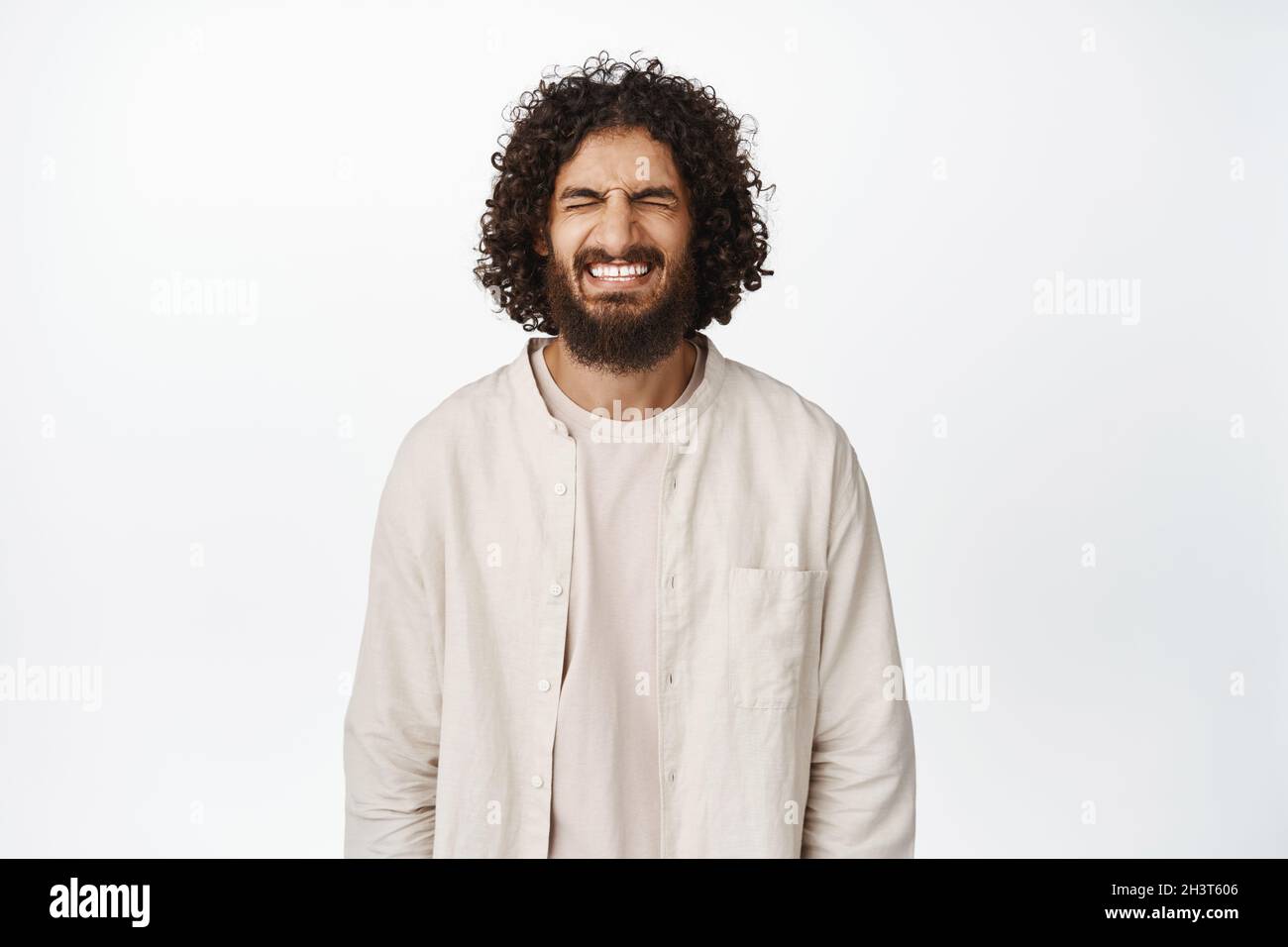 Image of sad and gloomy middle eastern guy feeling pain, crying and ...