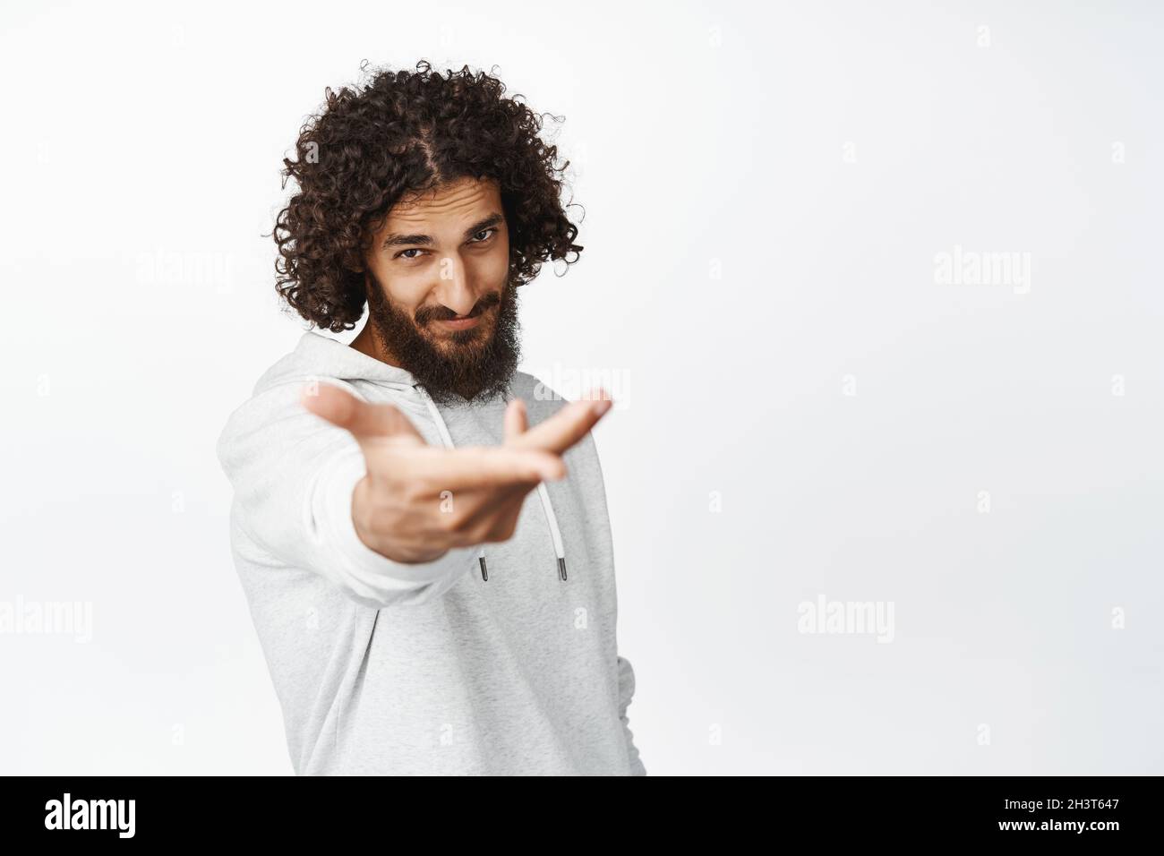 Passionate handsome hispanic man, romantic extend his hand, inviting ...