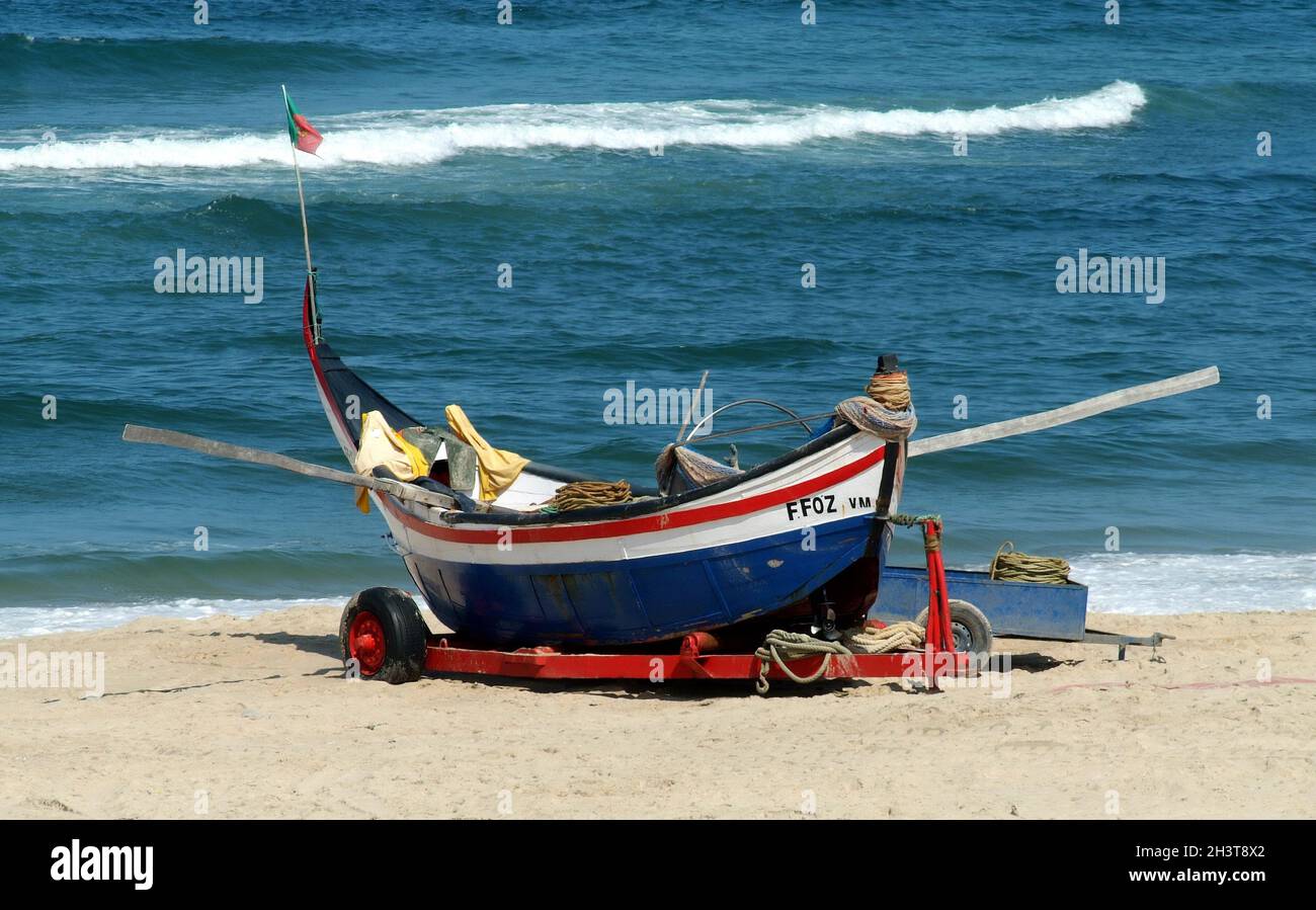 Traditional fishing boat on the Atlantic beach, Aveiro - Portugal Stock ...