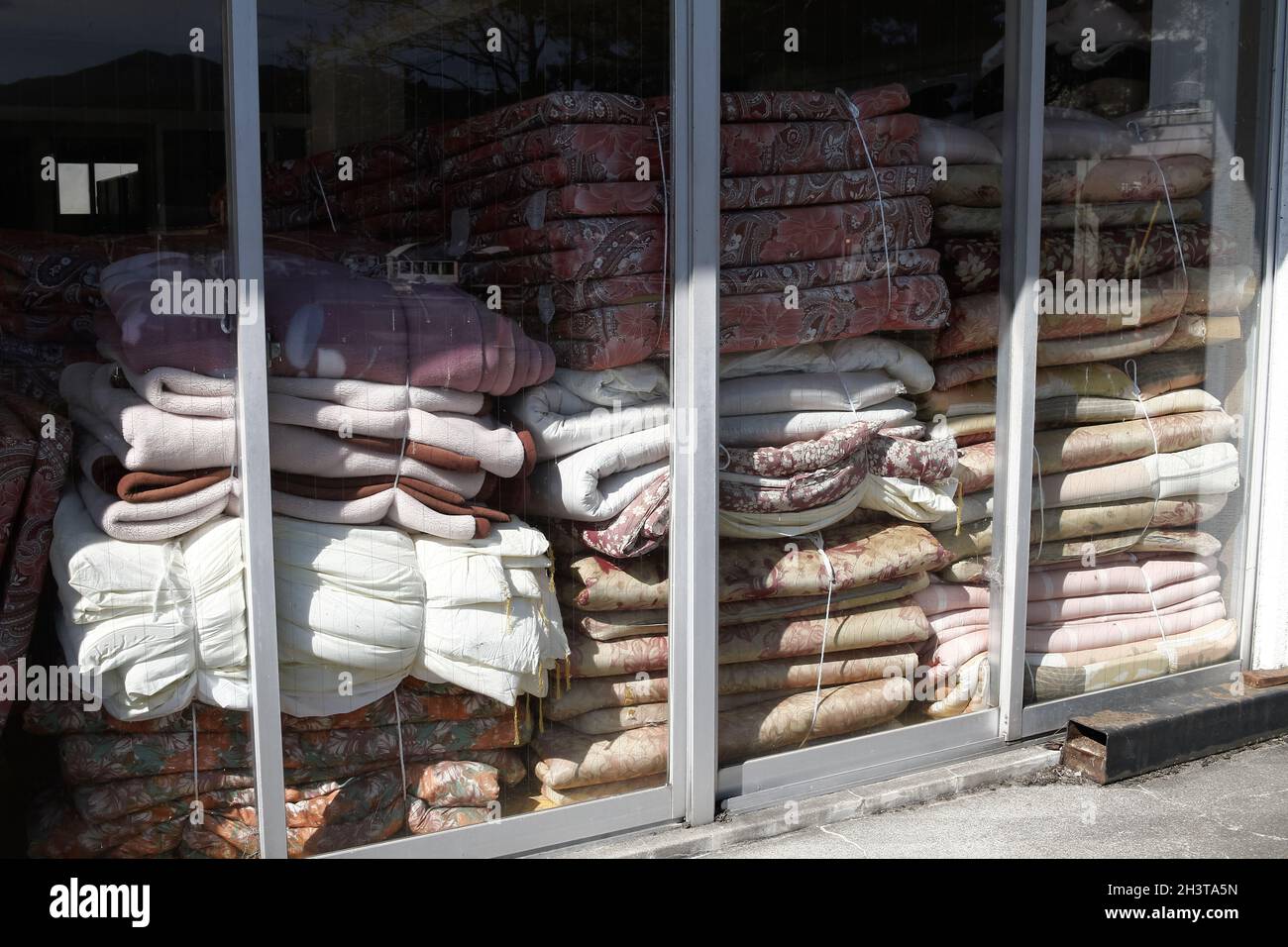 nojiri, nagano, japan, 2021-20-10 , Futons packed in a closed hotel in ...