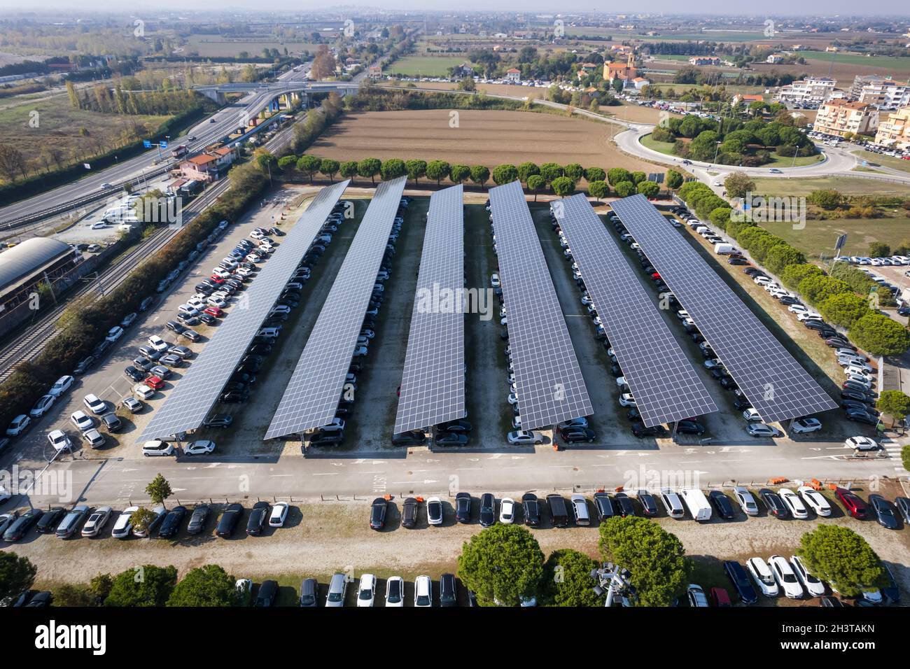 Aerial view of a car park with solar panels. Rimini, Italy - October ...