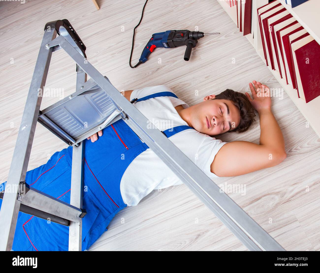 Unsafe behavior concept with falling worker Stock Photo - Alamy