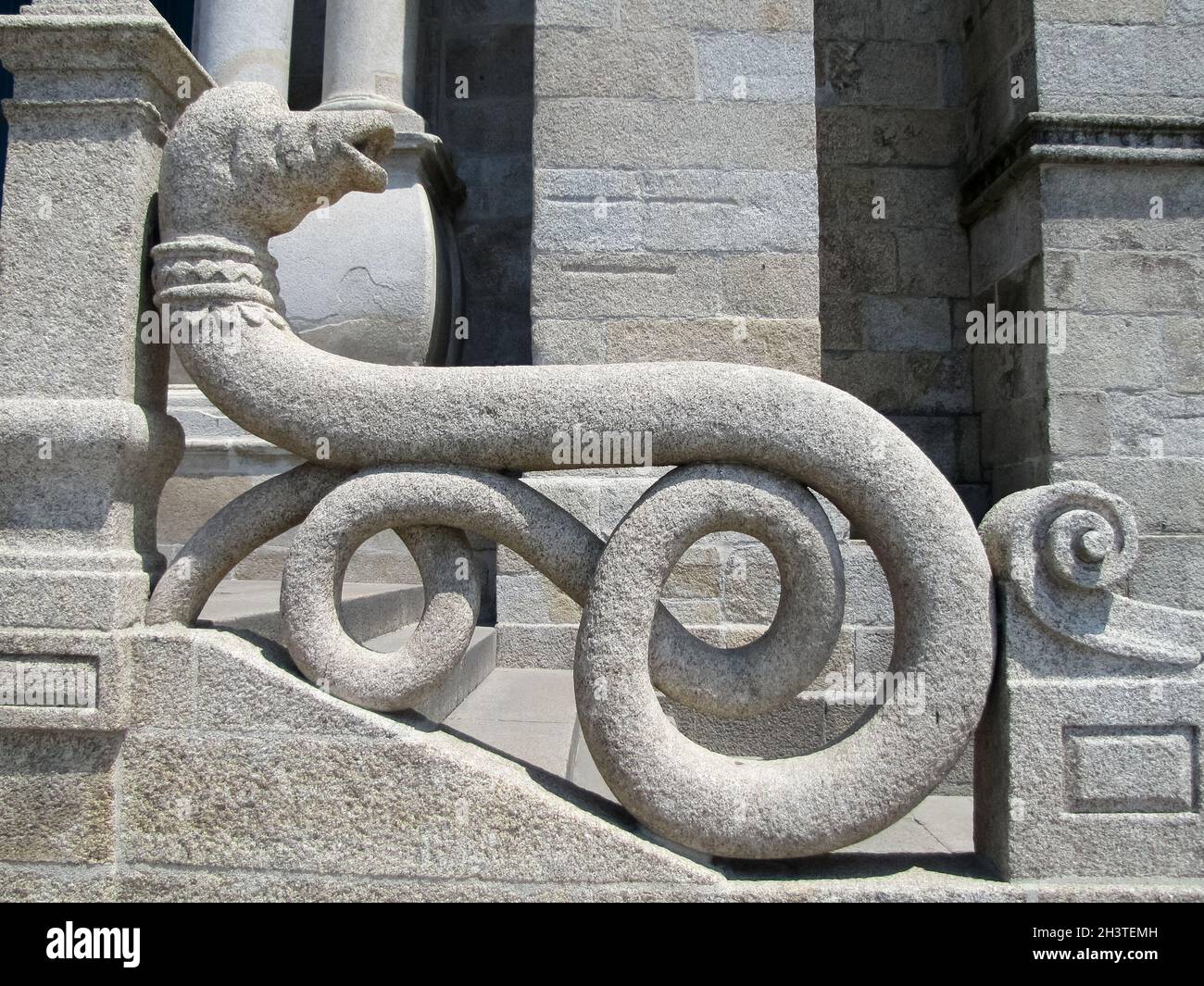 Railing in the form of stone snake. An element of the building's ...