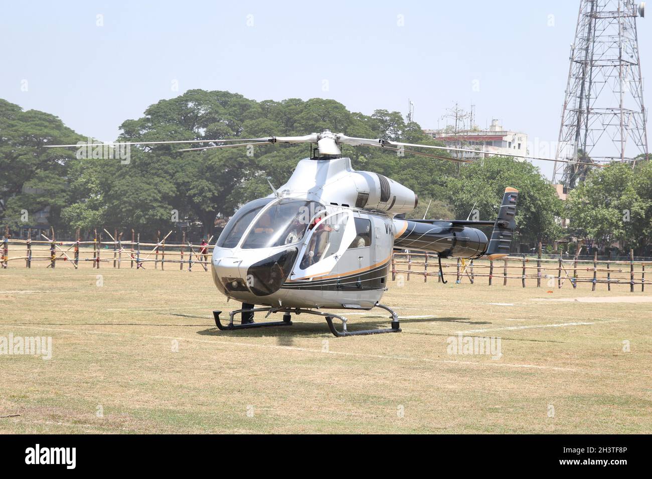 Helicopter landing in a empty field Stock Photo - Alamy