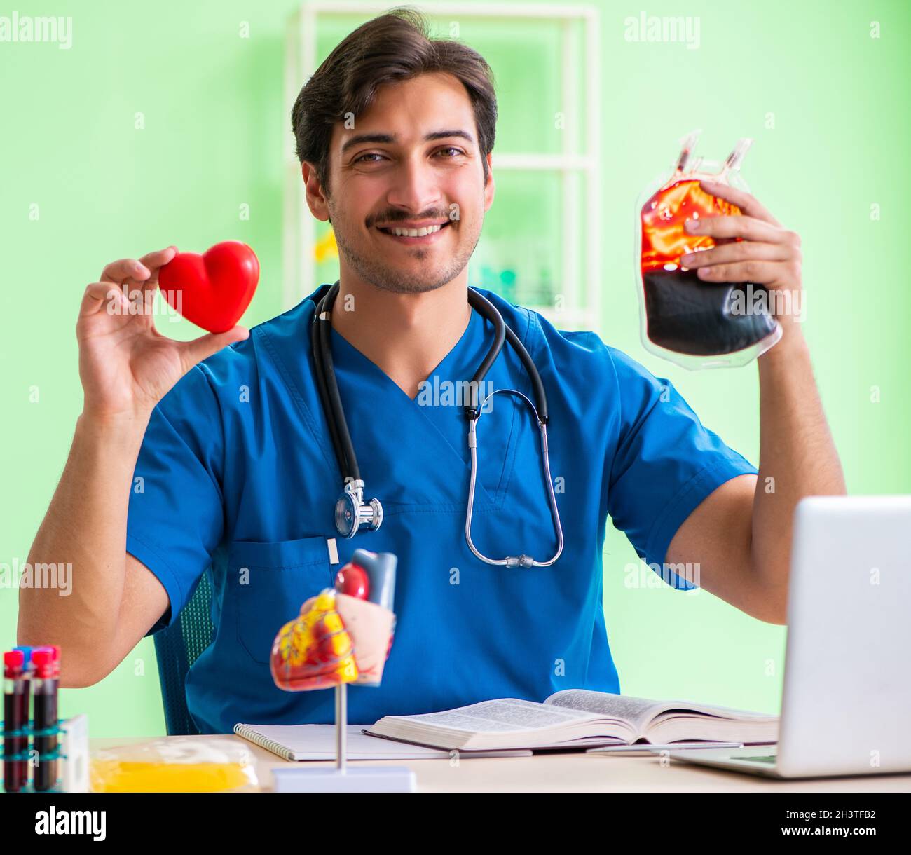 Doctor doing blood analysis in the lab Stock Photo - Alamy