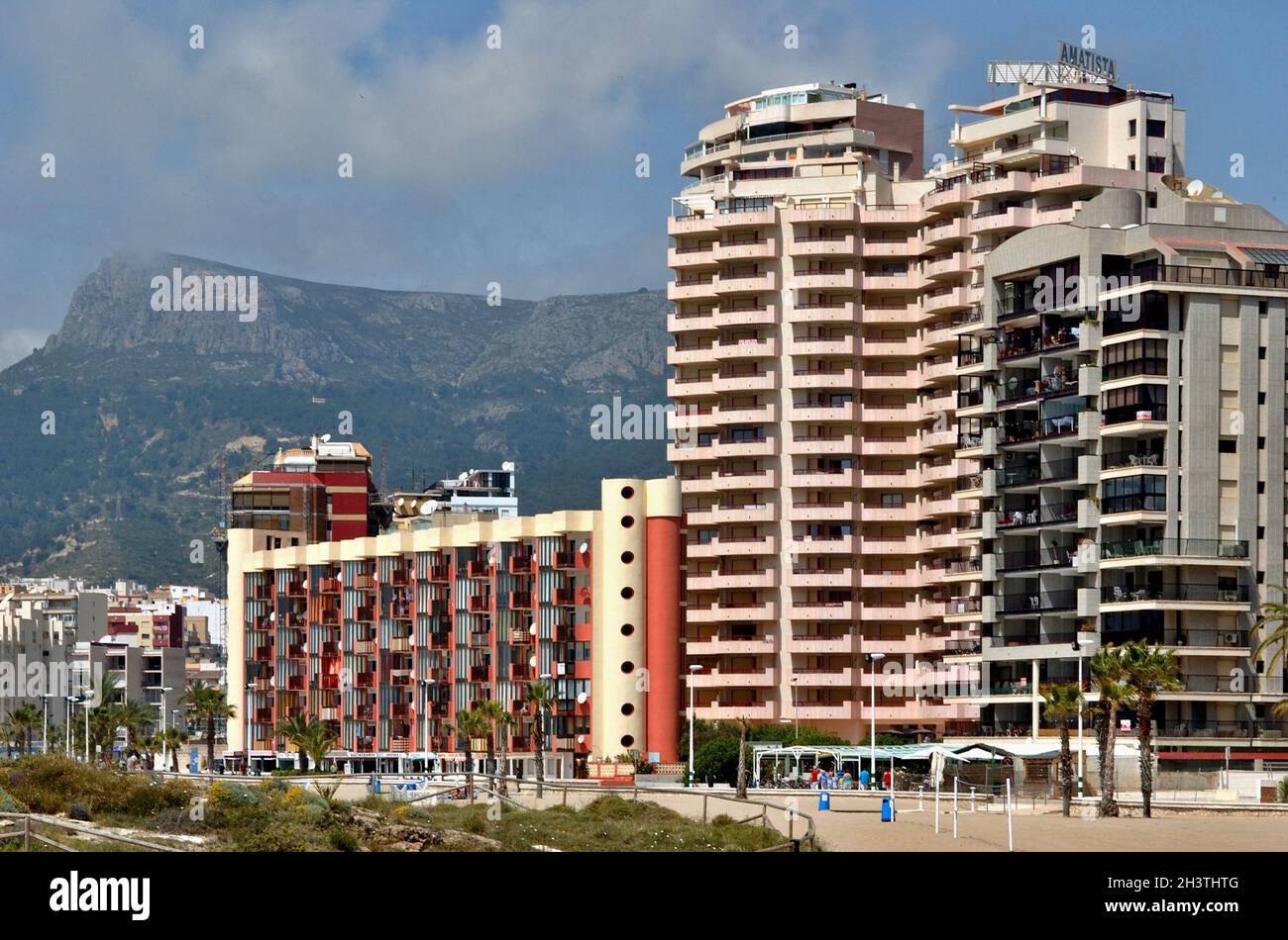 Beach promenade with high-rise architecture in Calpe, Alicante - Spain ...