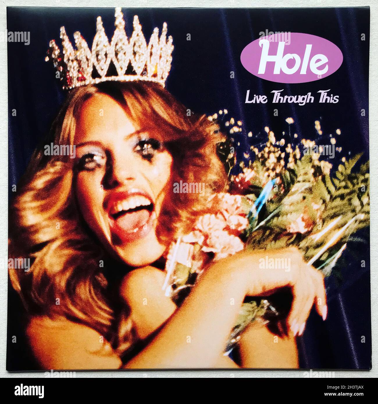 Hole live through this cover hi-res stock photography and images - Alamy
