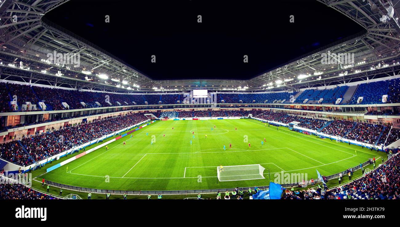 Soccer stadium arena with natural green grass Stock Photo - Alamy