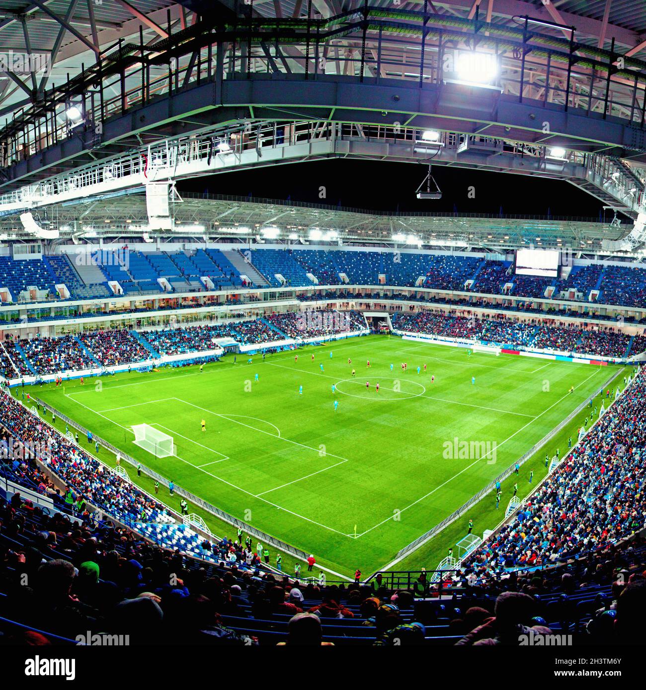 Soccer stadium arena with natural green grass Stock Photo - Alamy