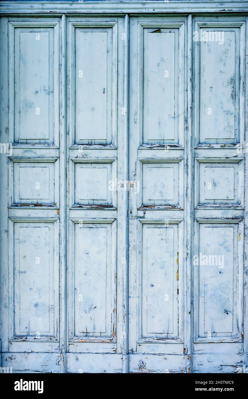 Wooden old door of blue color, with carved rectangles and squares Stock ...
