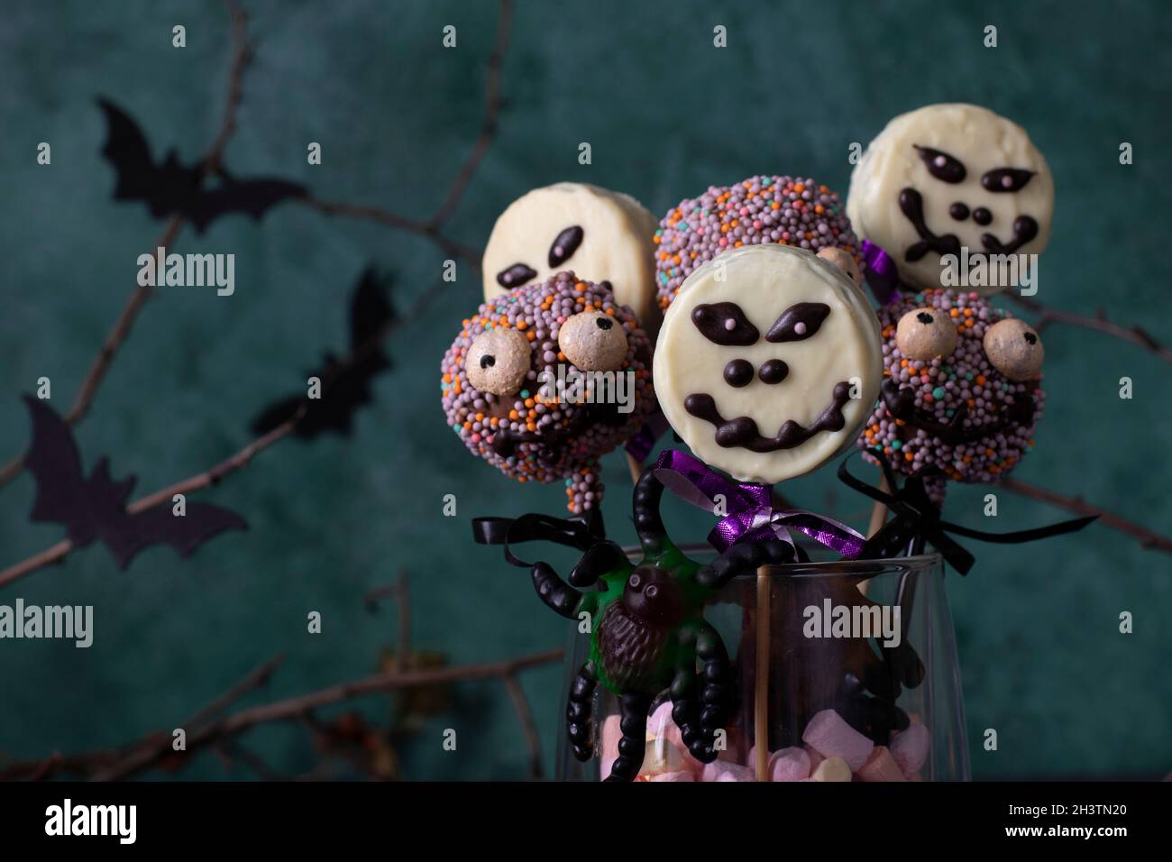 Homemade Halloween cakes pops skeletons and monsters with white ...