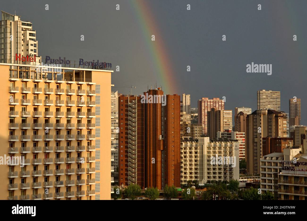 Skyscraper skyline in Benidorm with rainbow, Alicante - Spain Stock ...
