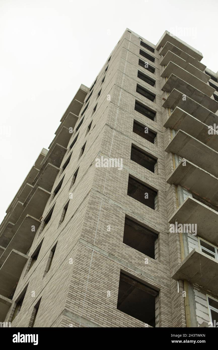 Windows of the house under construction. Construction of a building in ...